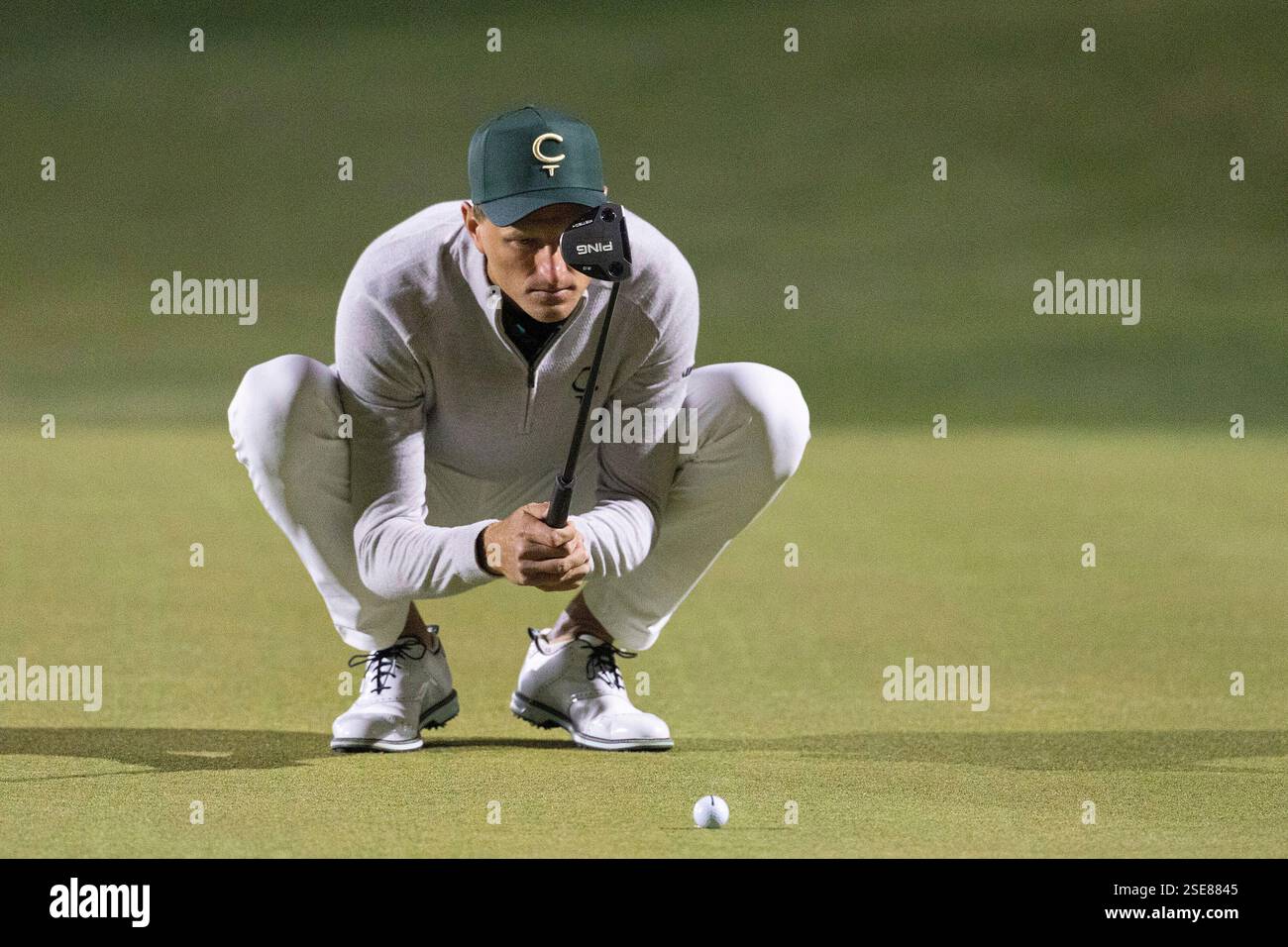 Adrian Meronk of Cleeks GC lines up a putt on the first green during ...