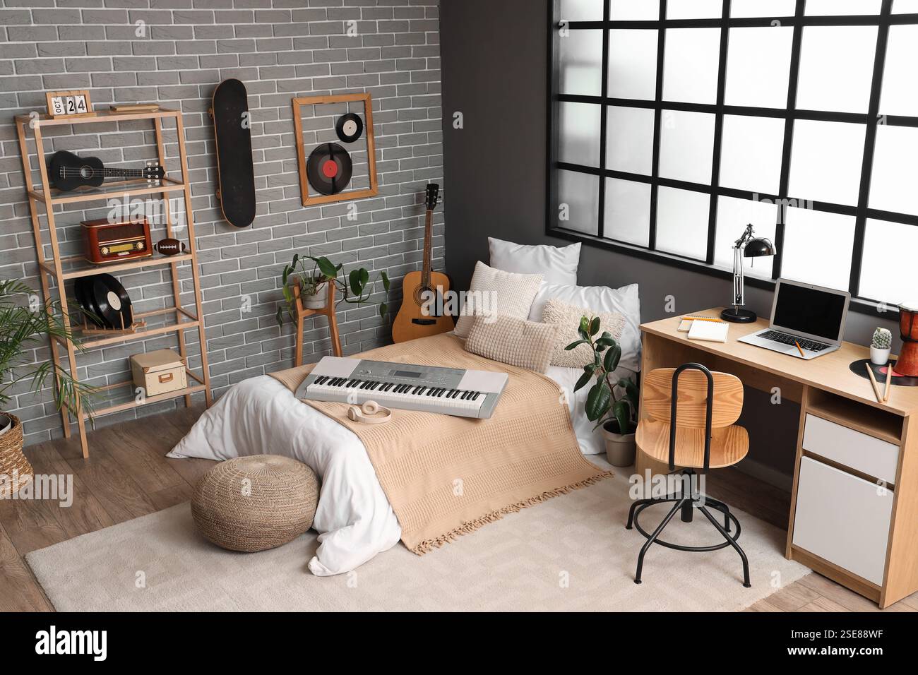 Interior of bedroom with musical instruments and workplace Stock Photo ...