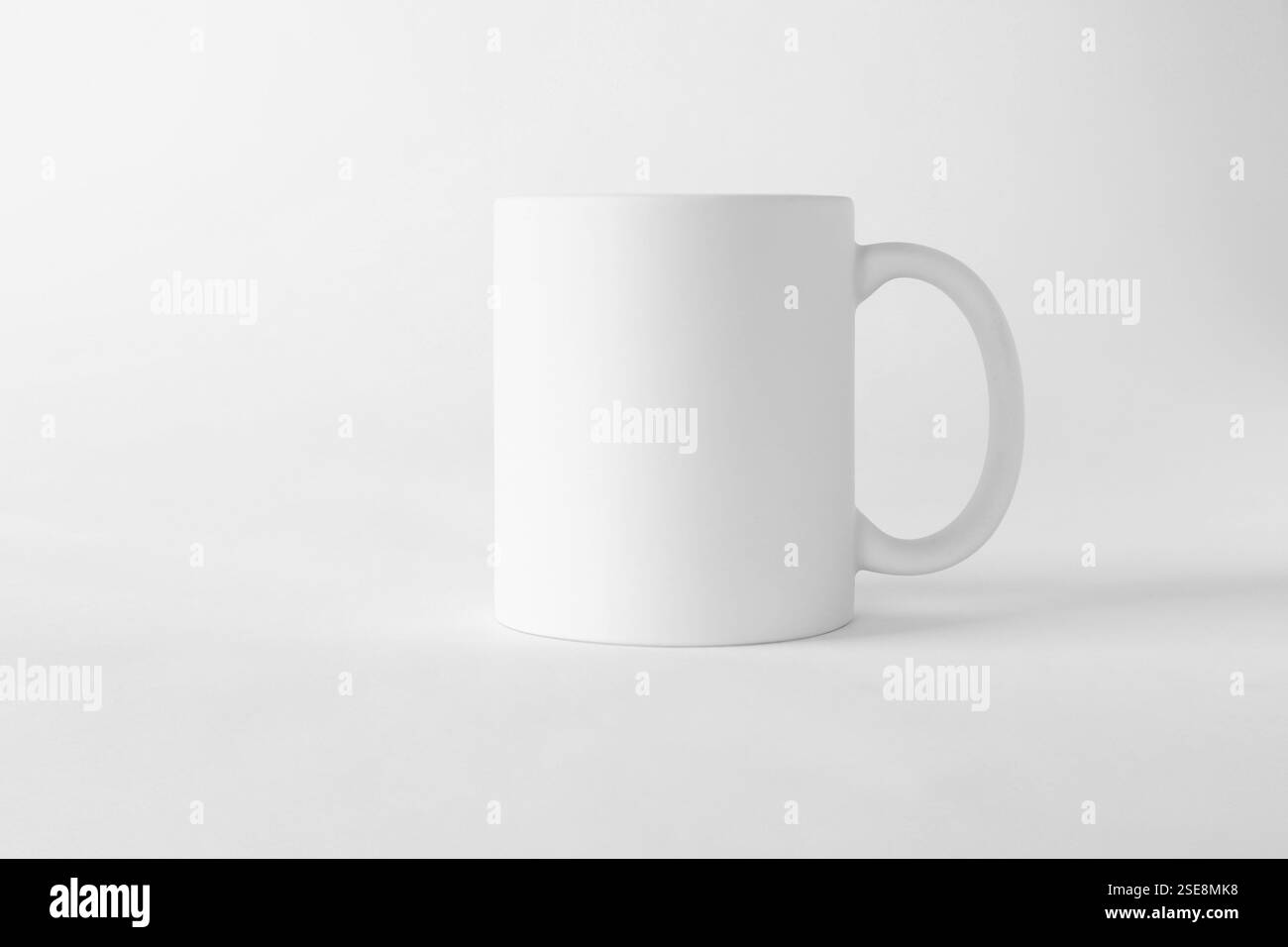 One blank mug on white background. Mockup for design Stock Photo - Alamy