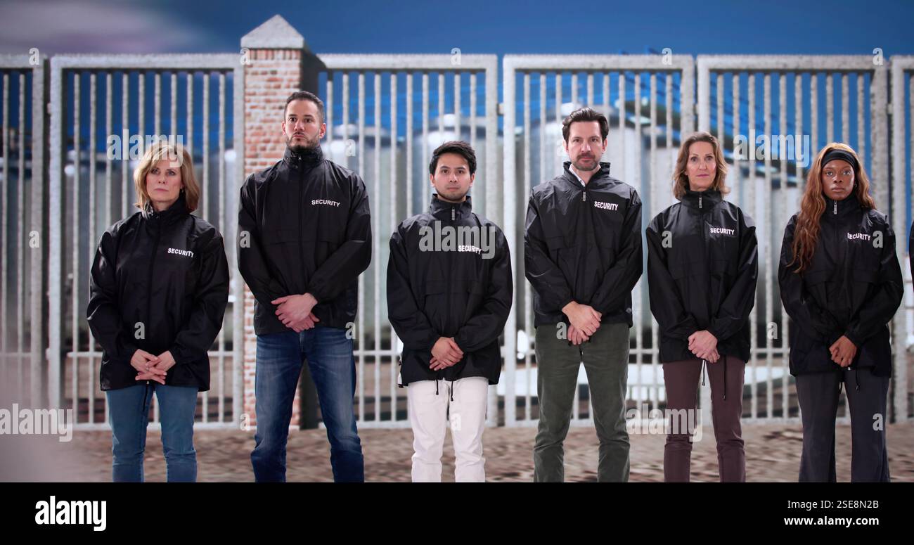 Diverse team of security guard officers safeguarding facility entrance ...