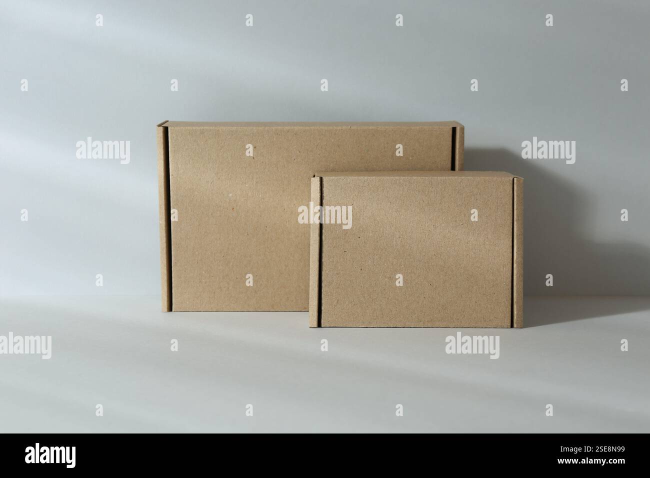 Blank cardboard boxes on white background. Mockup for design Stock ...
