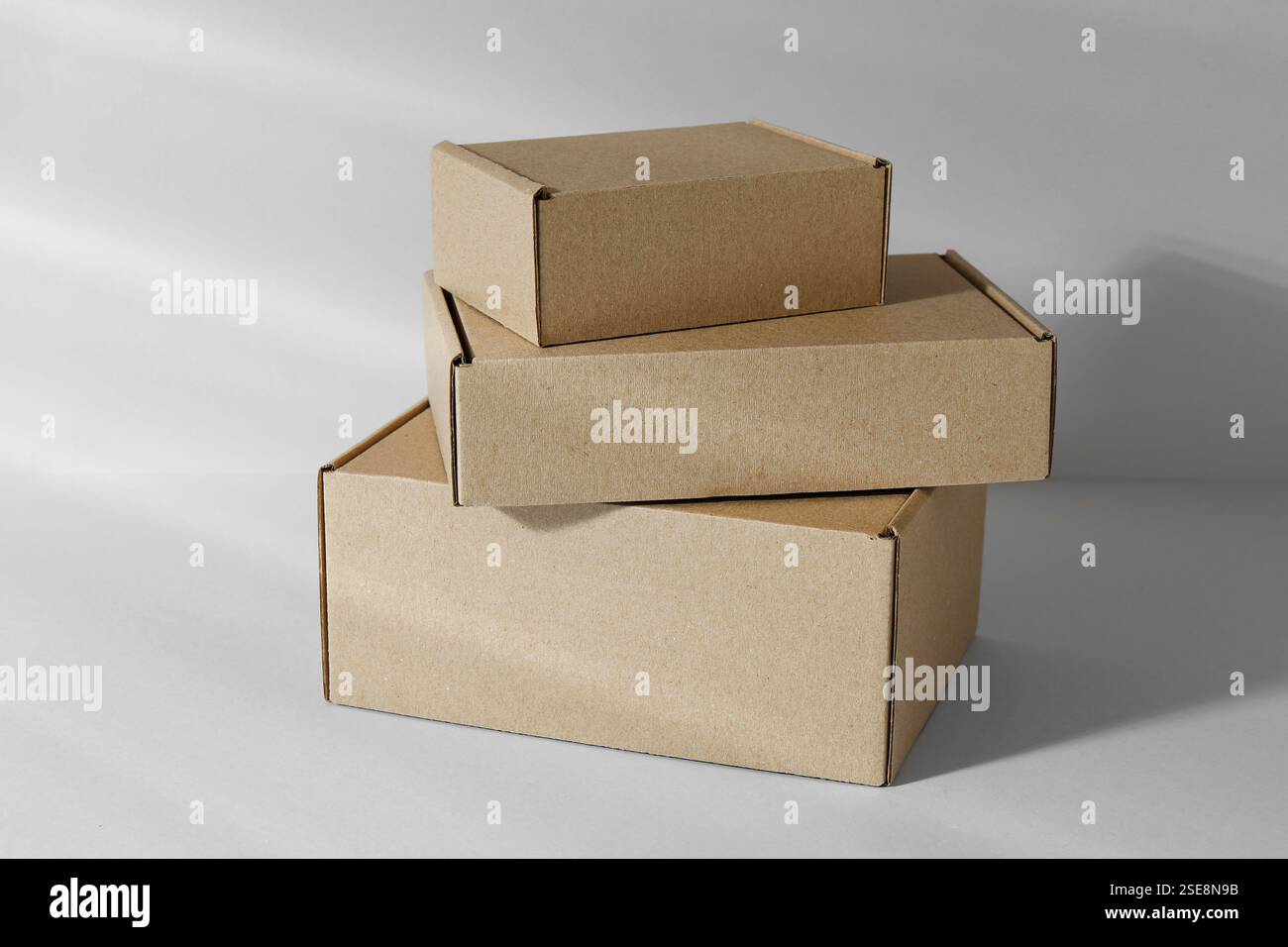 Blank cardboard boxes on white background. Mockup for design Stock ...