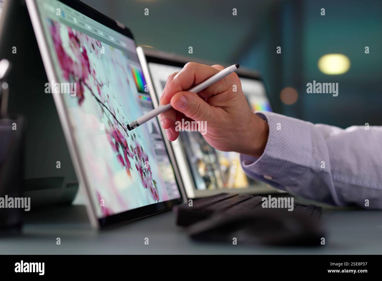 Office Designer At Work: Graphic Artist On Computer Stock Photo - Alamy