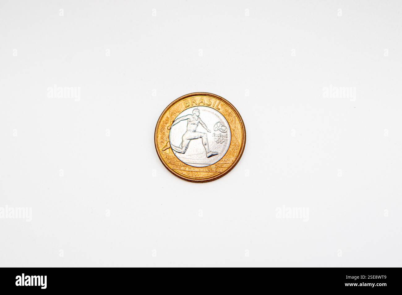 1 real coin commemorating the olympics on a white background in rio de ...