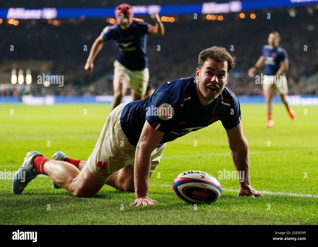 France's Damian Penaud celebrates scoring a try during the Guinness Men ...