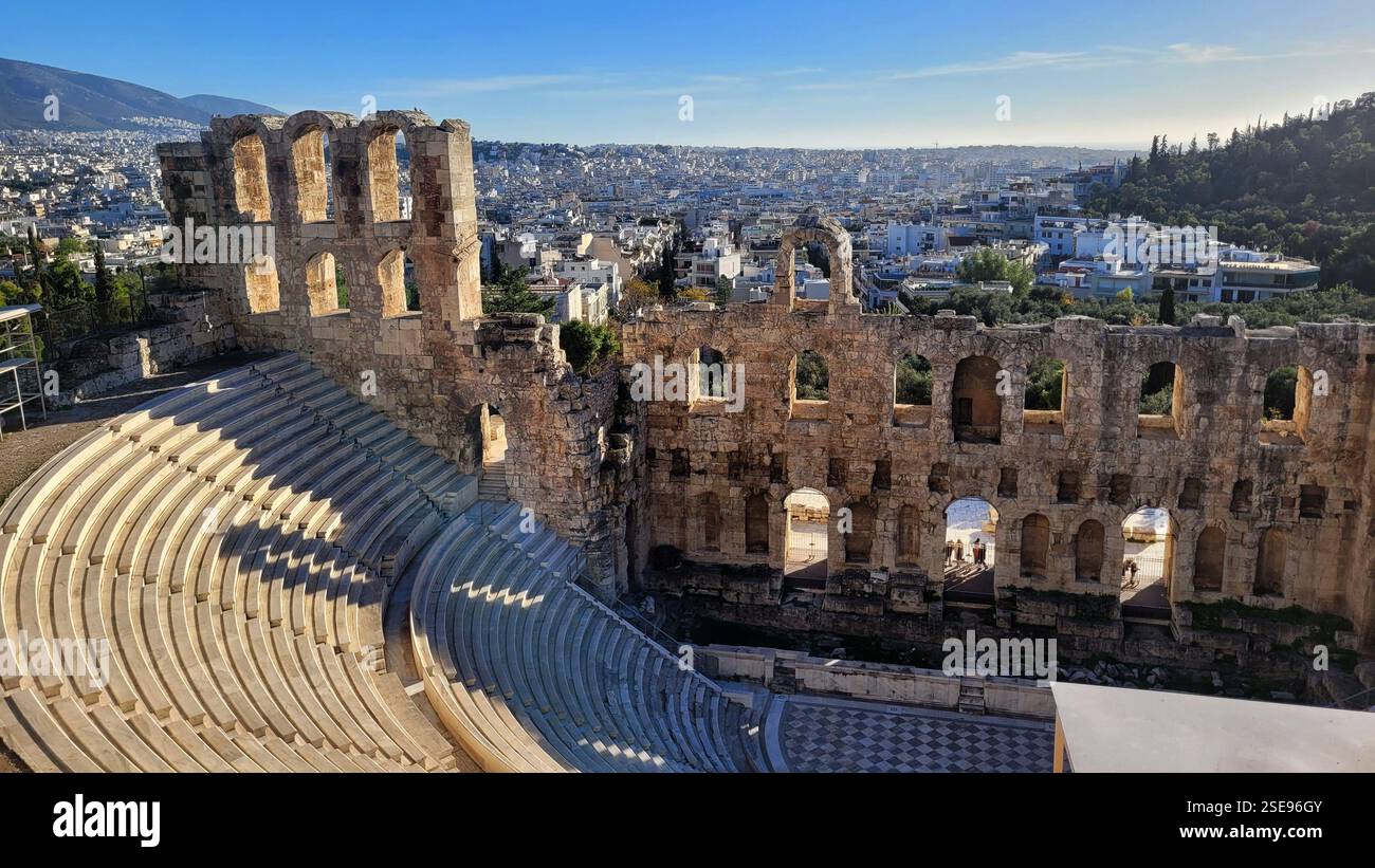 The photograph shows a view of the ancient Odeon of Herodes Atticus ...