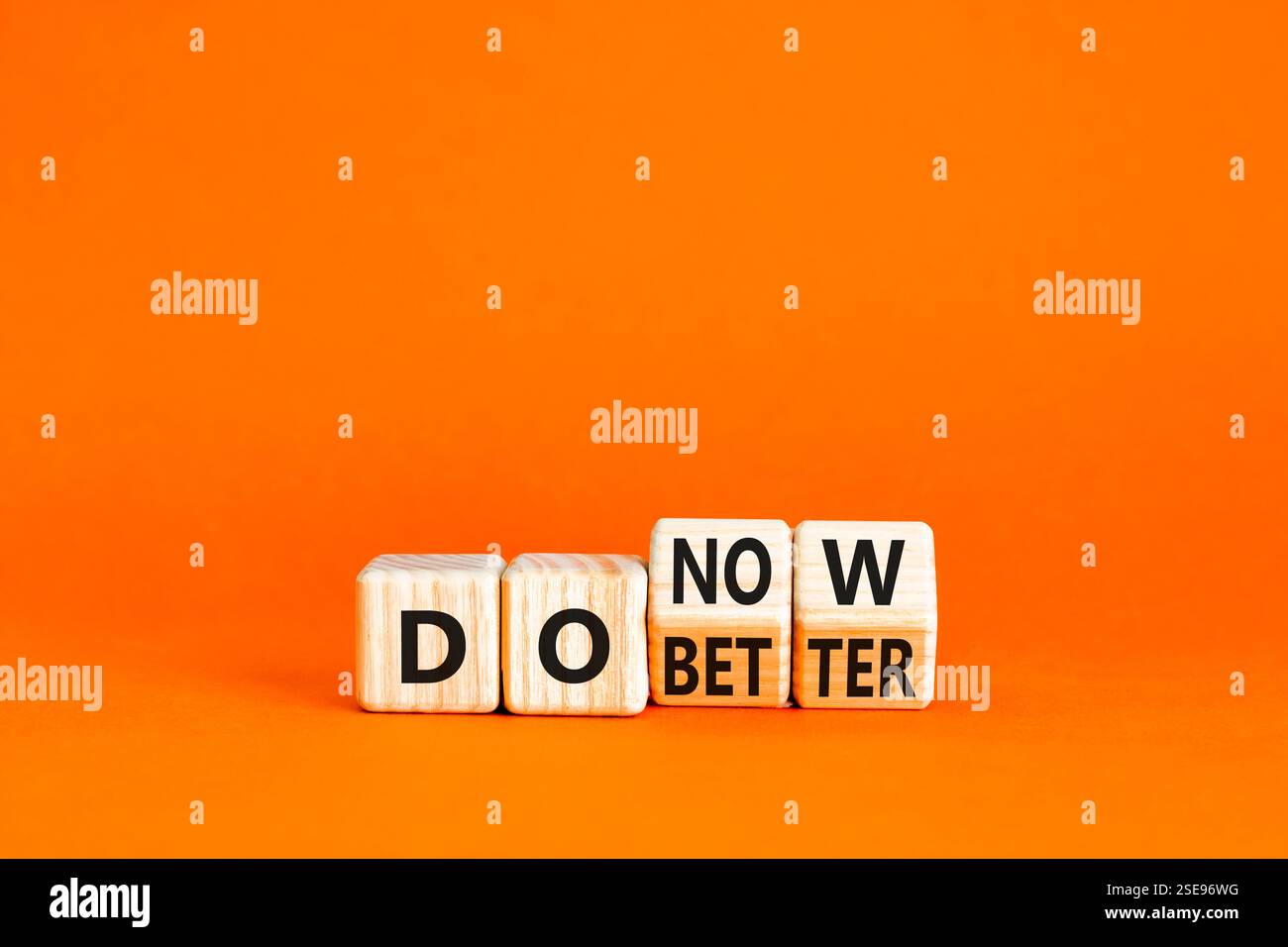 Do better and now symbol. Concept words Do better Do now on wooden ...