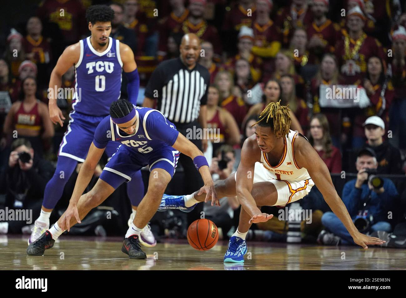 TCU forward David Punch (15) and Iowa State center Dishon Jackson (1 ...