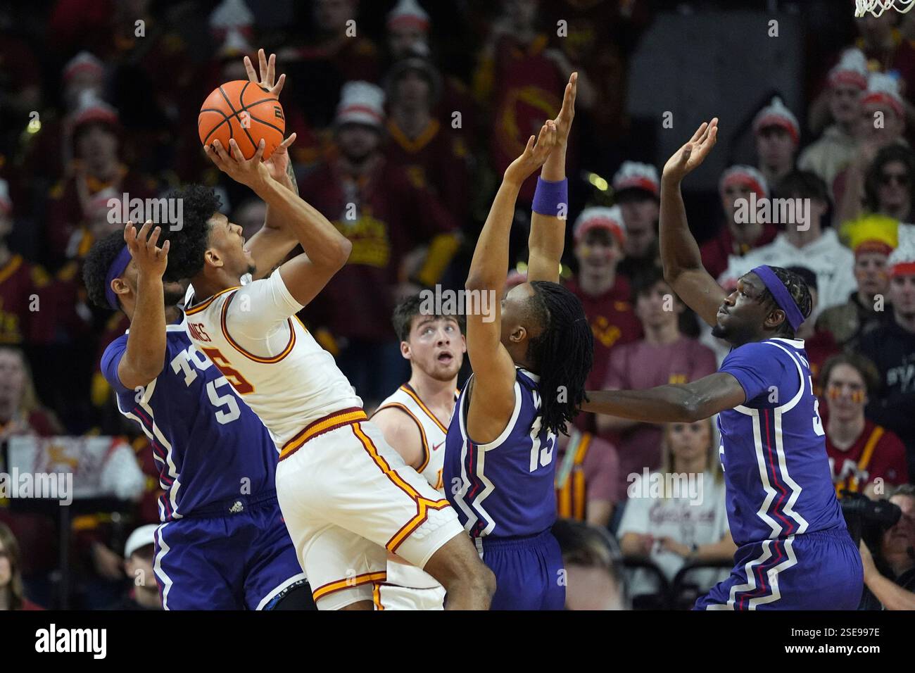Iowa State guard Curtis Jones (5) pulls up for a shot as he is fouled ...