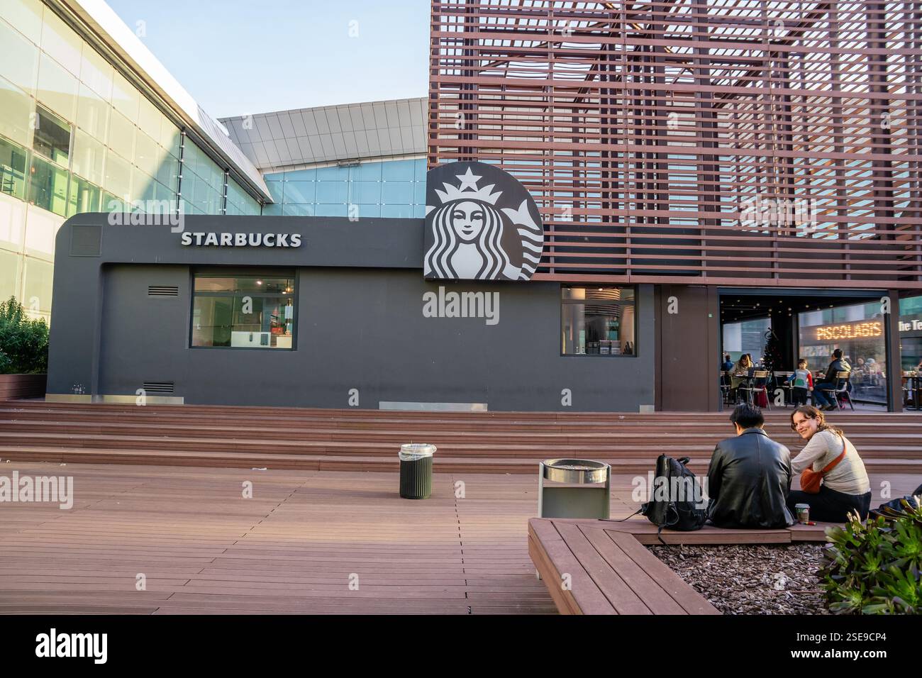 Modern Starbucks outlet at Barcelona Airport with minimalist black ...