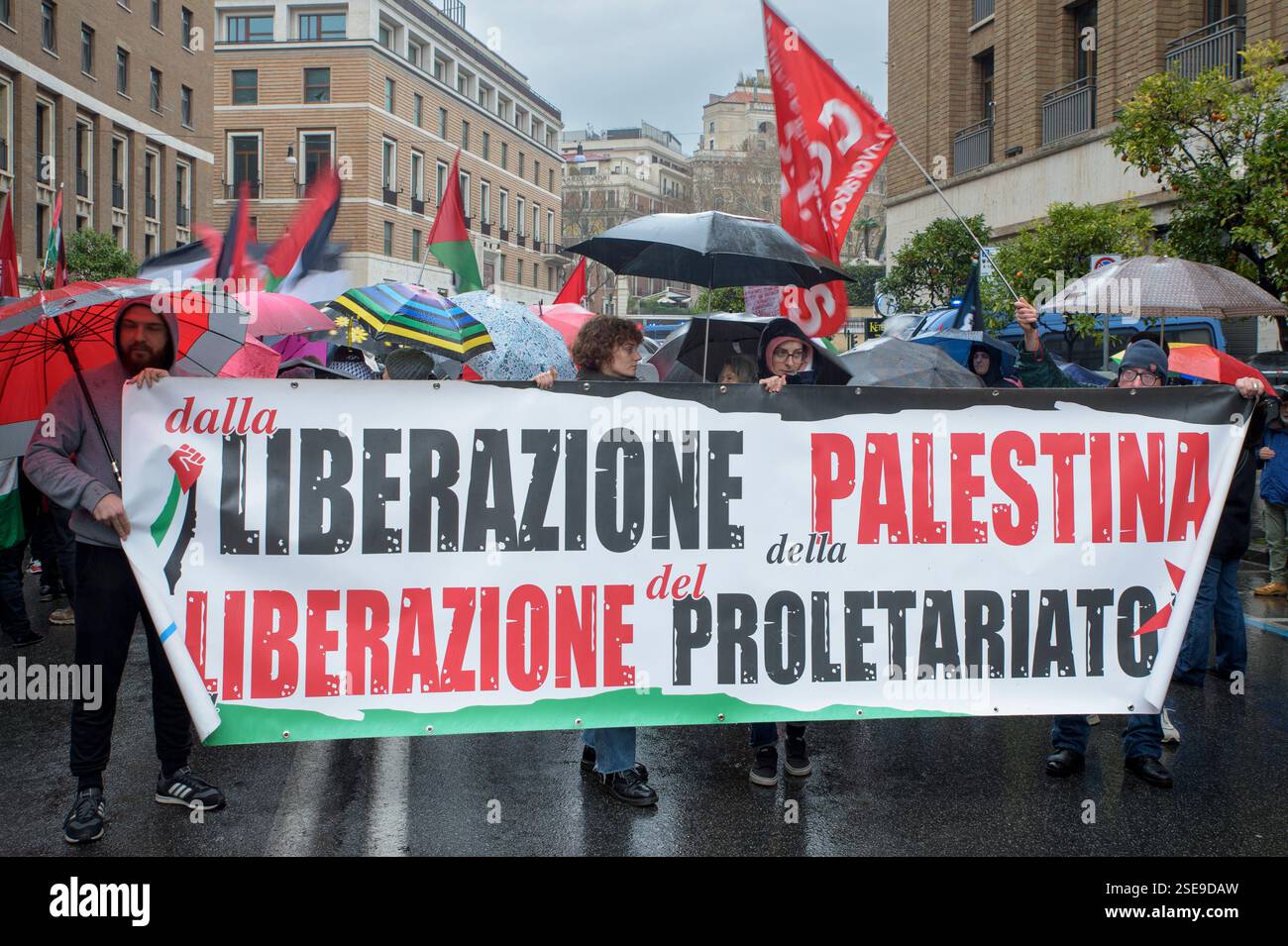 Rome, Italy. 8th Feb, 2025. Protesters hold a banner with the slogan ...