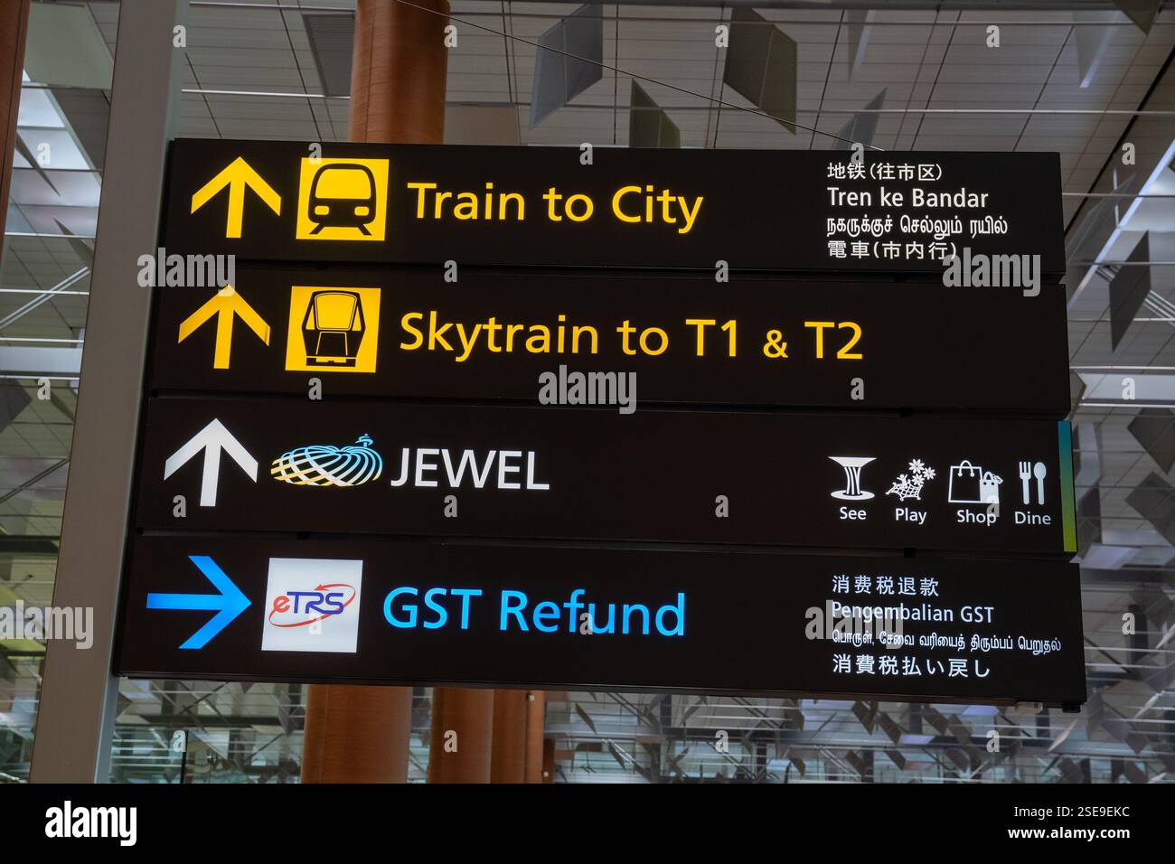 airport sign with indications to TRan to city, Skyrain, Jewel and GST ...