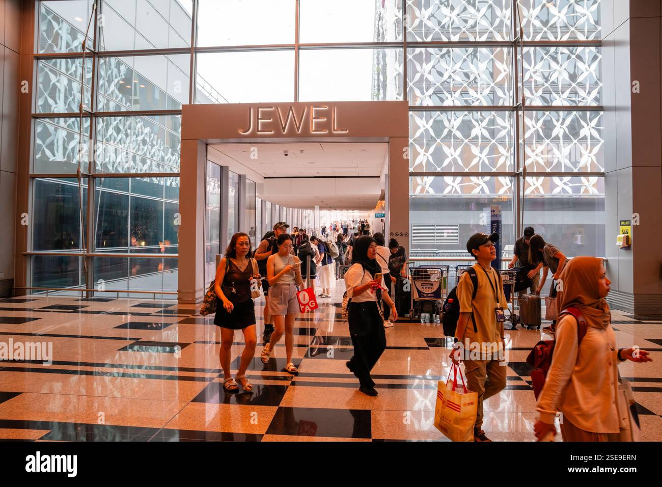 Entrance to jewel terminal, very busy day, Changi airport, Singapore ...