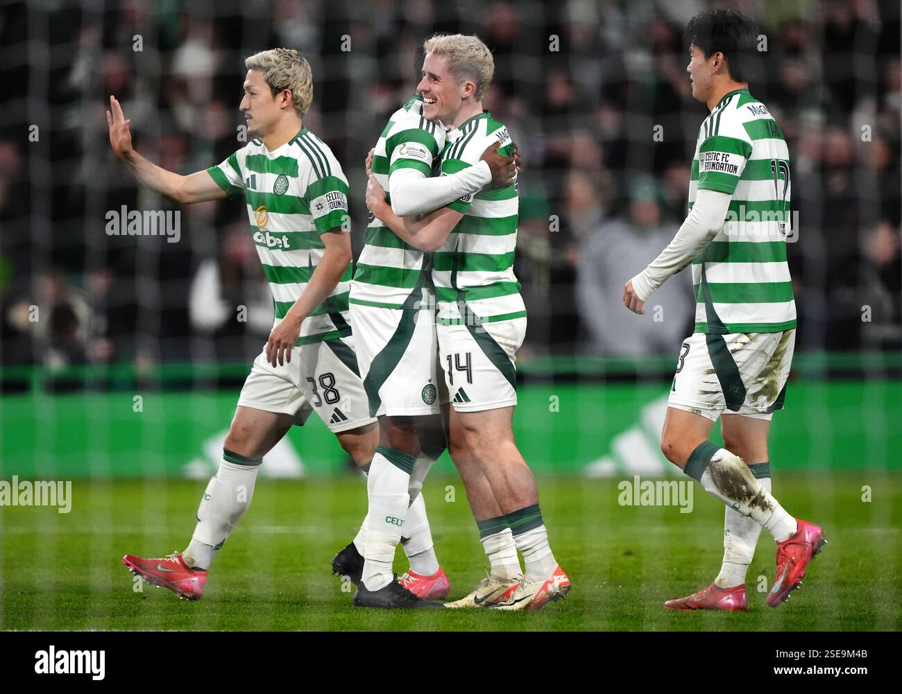 Celtic's Luke McCowan (centre) celebrates scoring their side's third ...