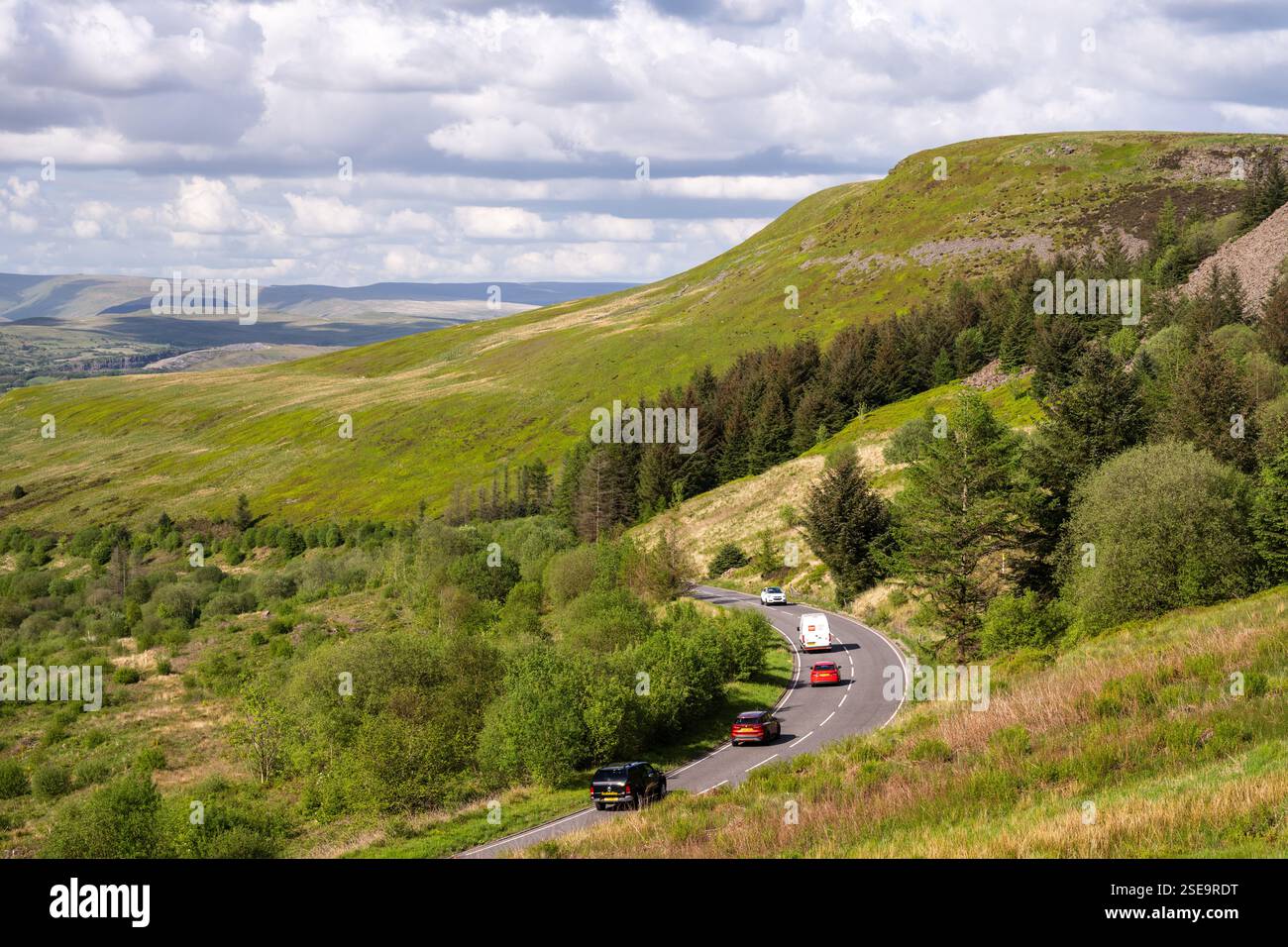 Traffic crosses the hills of South Wales on the A4061 Rhigos Road pass ...