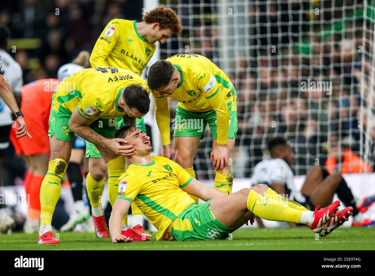 Norwich, UK. 08th Feb, 2025. Callum Doyle of Norwich City goes down ...