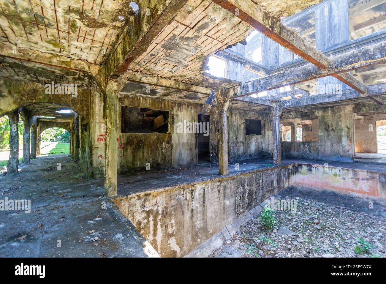 Ruins of the mile long barracks with crumbling walls and overgrown ...