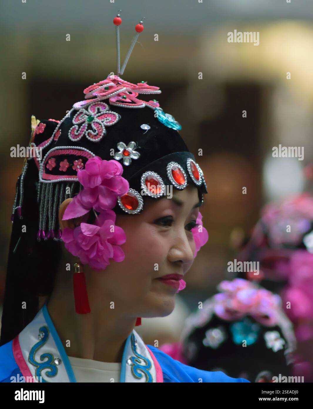 Chinese lady in traditional attire. A chinese lady dancing at Woking ...