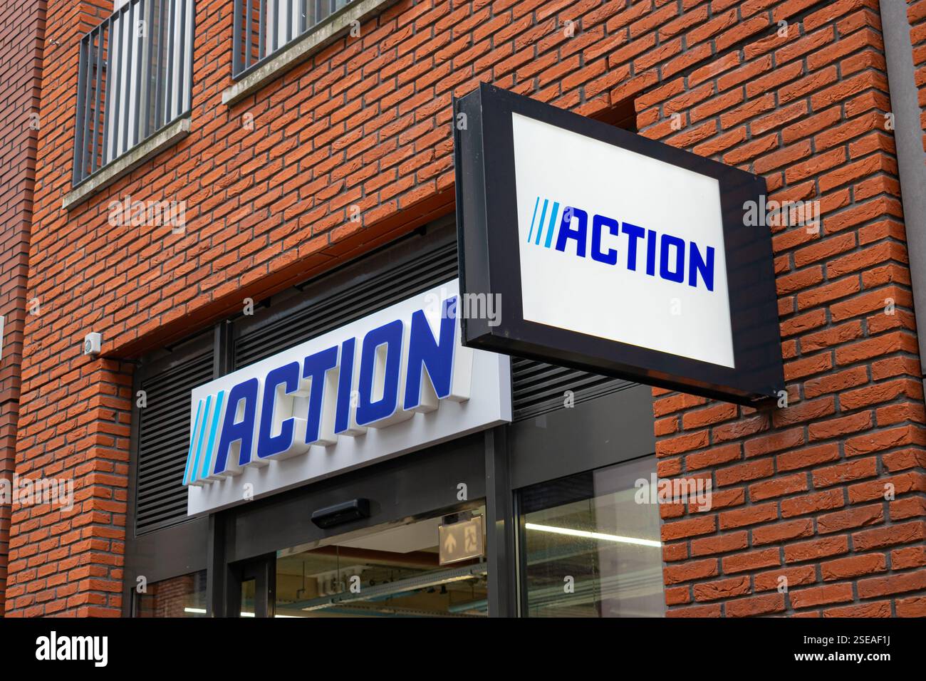 Logo of international discount store Action Stock Photo - Alamy