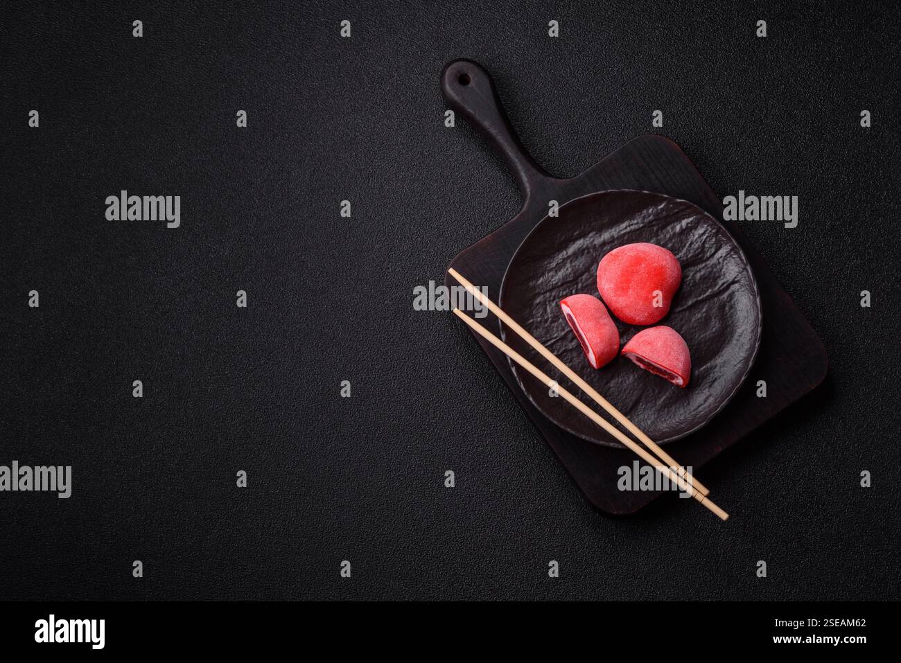 Delicious sweet mochi in the shape of red hearts for the holiday of ...