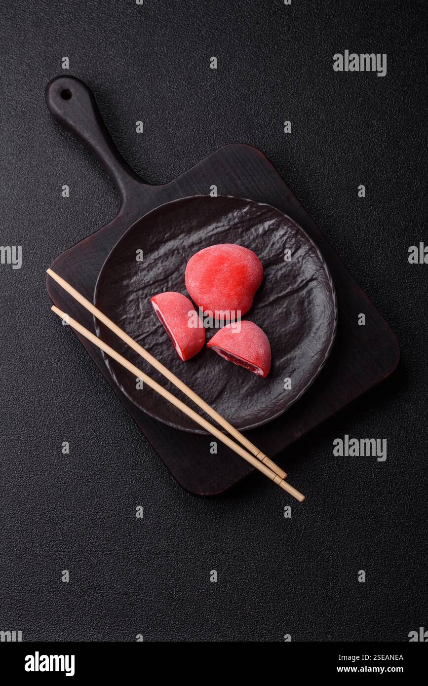 Delicious sweet mochi in the shape of red hearts for the holiday of ...