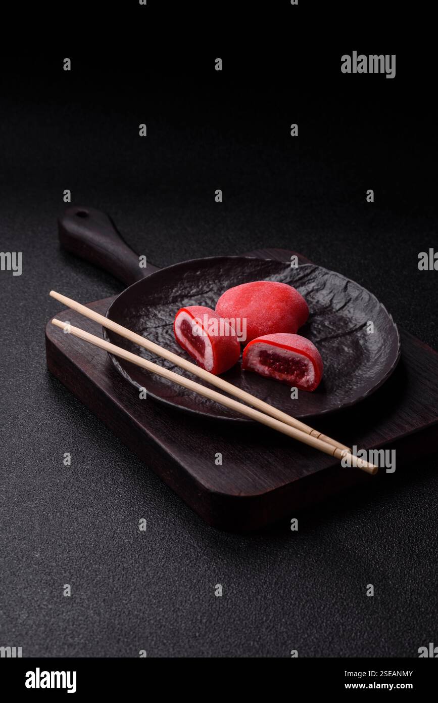 Delicious sweet mochi in the shape of red hearts for the holiday of ...