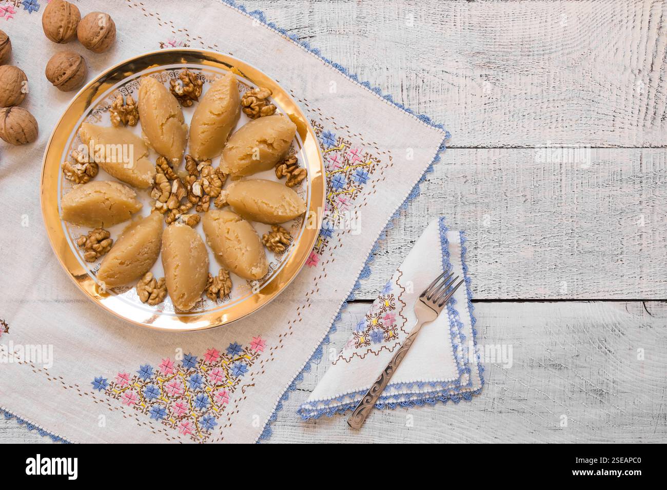 Turkish famous traditional homemade flour halva served with walnut in ...