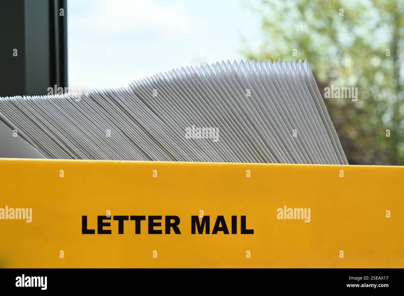 Mailbox with letter mailing sorted by zip code for delivery and postage ...