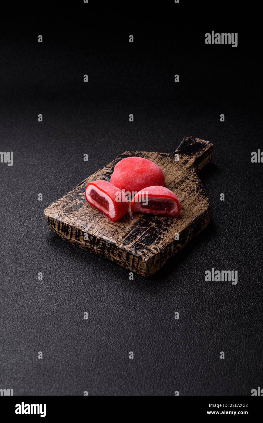 Delicious sweet mochi in the shape of red hearts for the holiday of ...