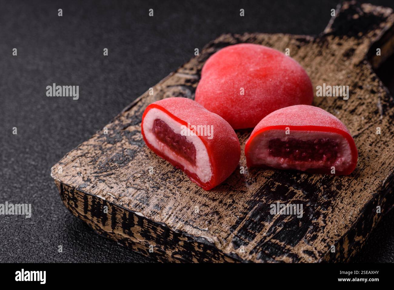 Delicious sweet mochi in the shape of red hearts for the holiday of ...