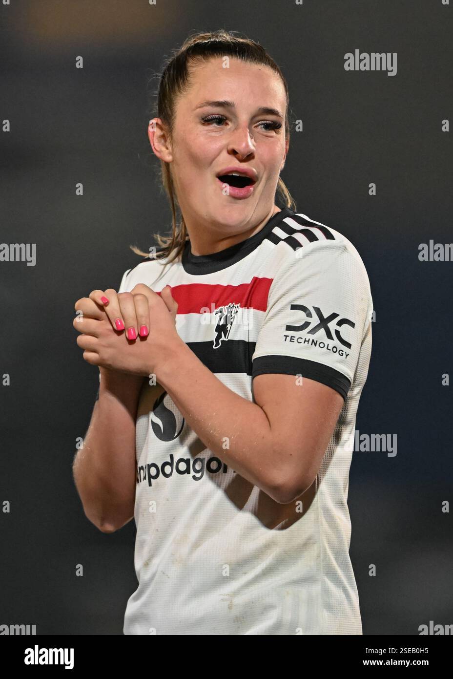 Manchester United's Ella Toone applauds fans at full time following the ...