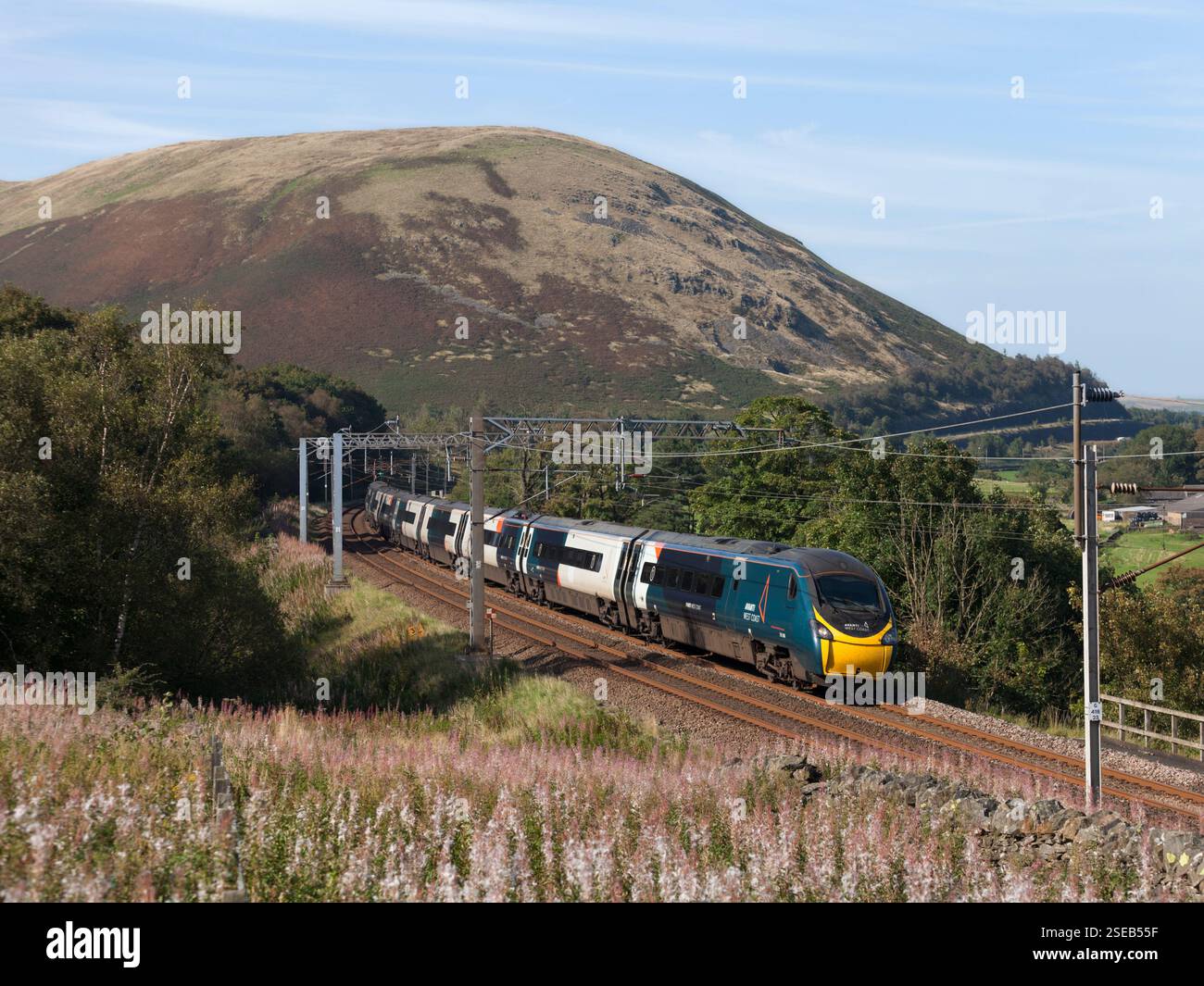 Avanti west coast Alstom pendolino train 390046 running through the ...