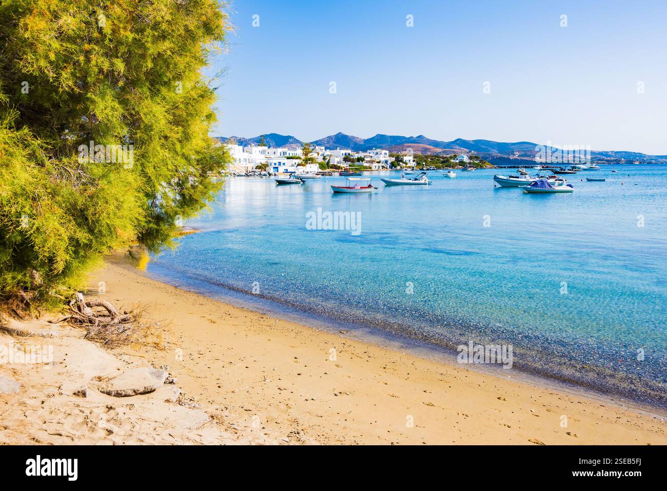 Beautiful sandy beach in Pollonia port, Milos island, Cyclades, Greece ...