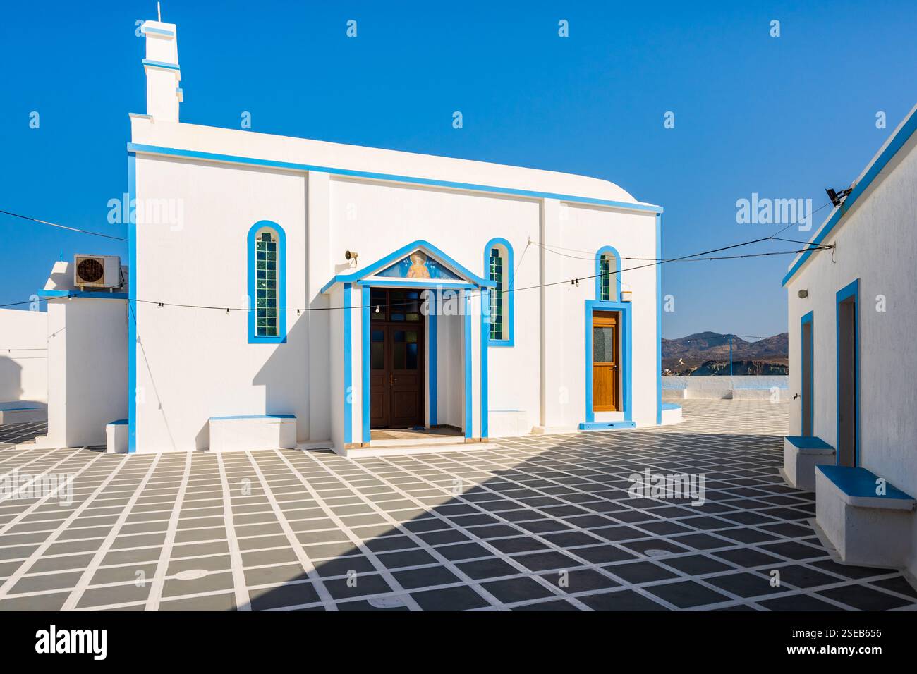 Typical Greek white church in Pollonia village, Milos island, Cyclades ...