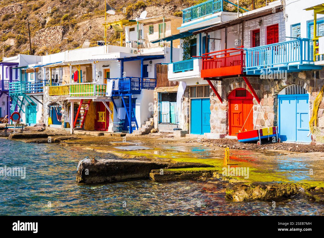 Colorful fishing boat houses in Klima village, Milos island, Cyclades ...