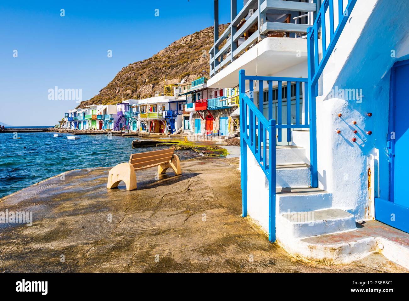 Coastal path and colorful fishing boat houses in Klima village, Milos ...