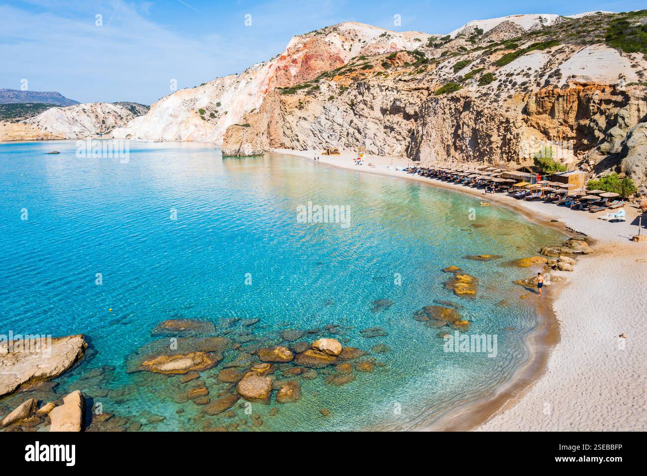 View of beautiful sandy Fyriplaka beach with azure sea water, Milos ...