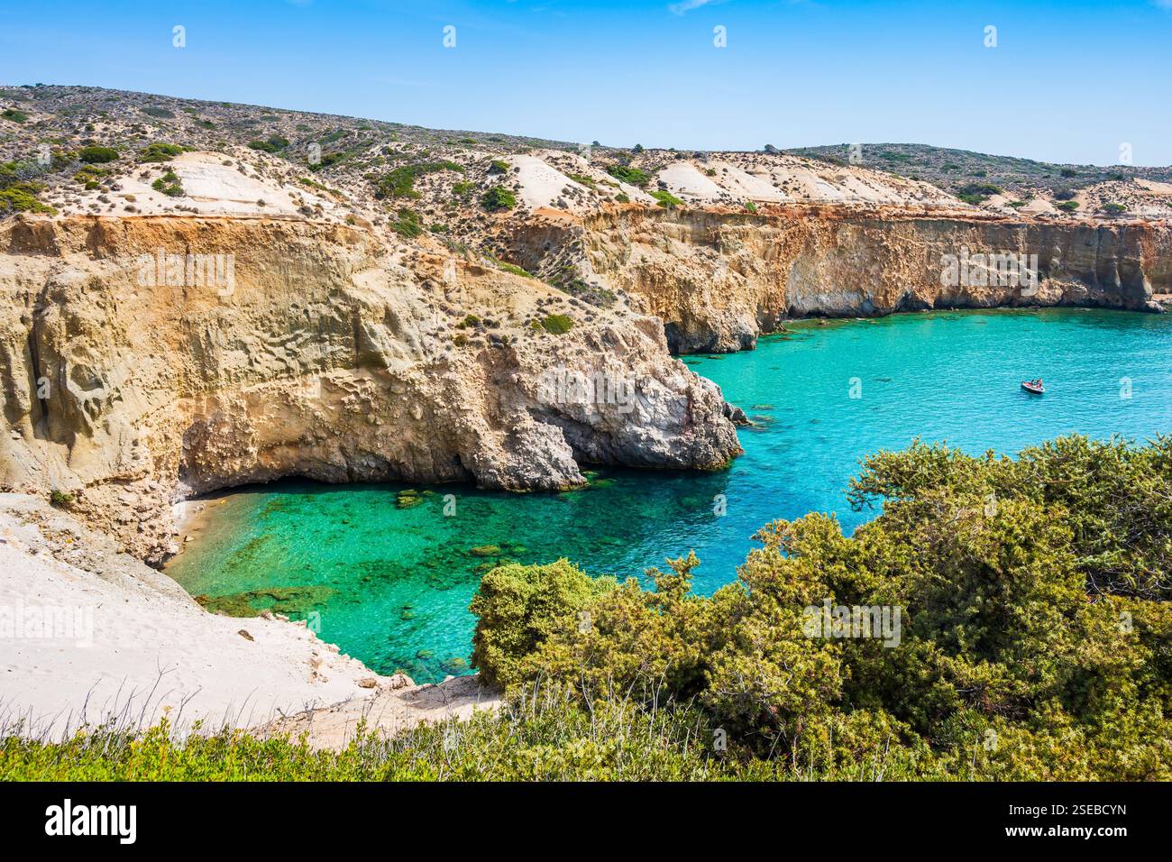 View of beautiful sandy Tsigrado beach with azure sea water, Milos ...