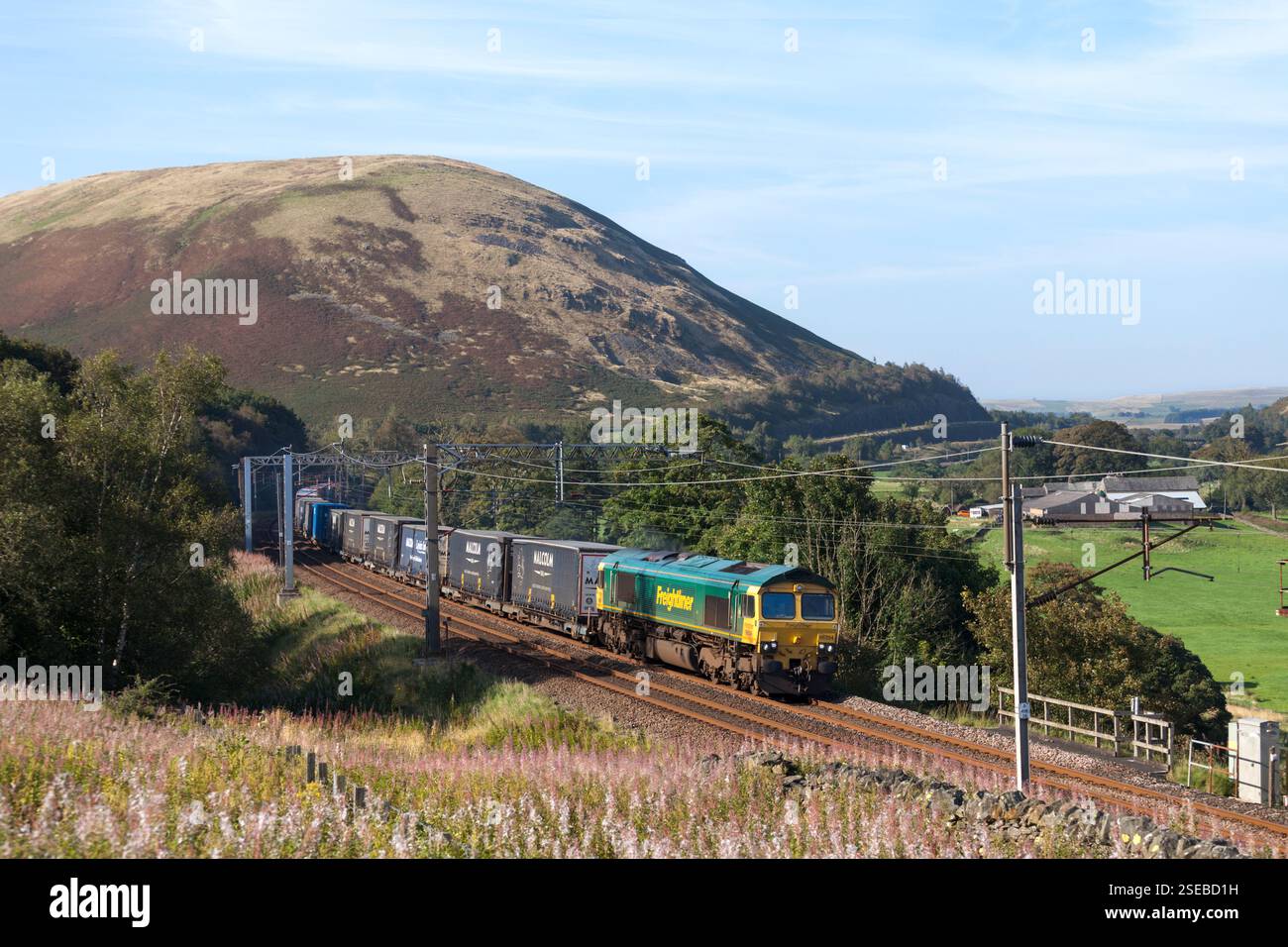 Freightliner class 66 diesel locomotive 66554 passing through Cumbria ...
