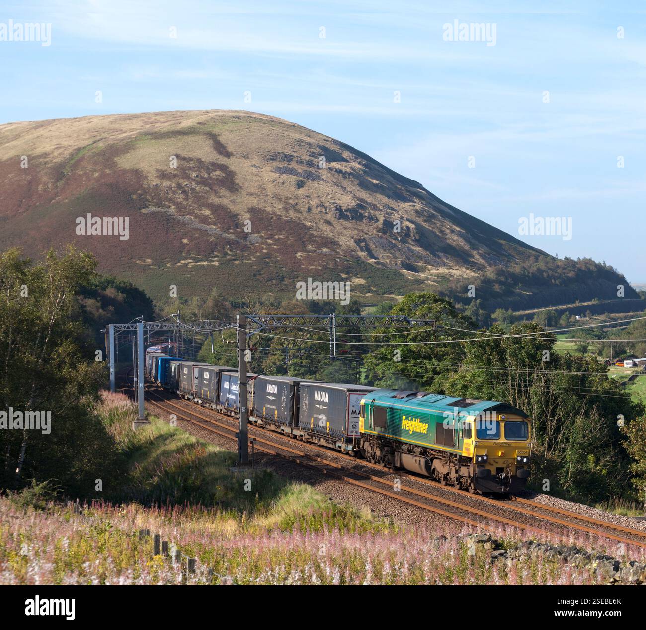 Freightliner class 66 diesel locomotive 66554 passing through Cumbria ...