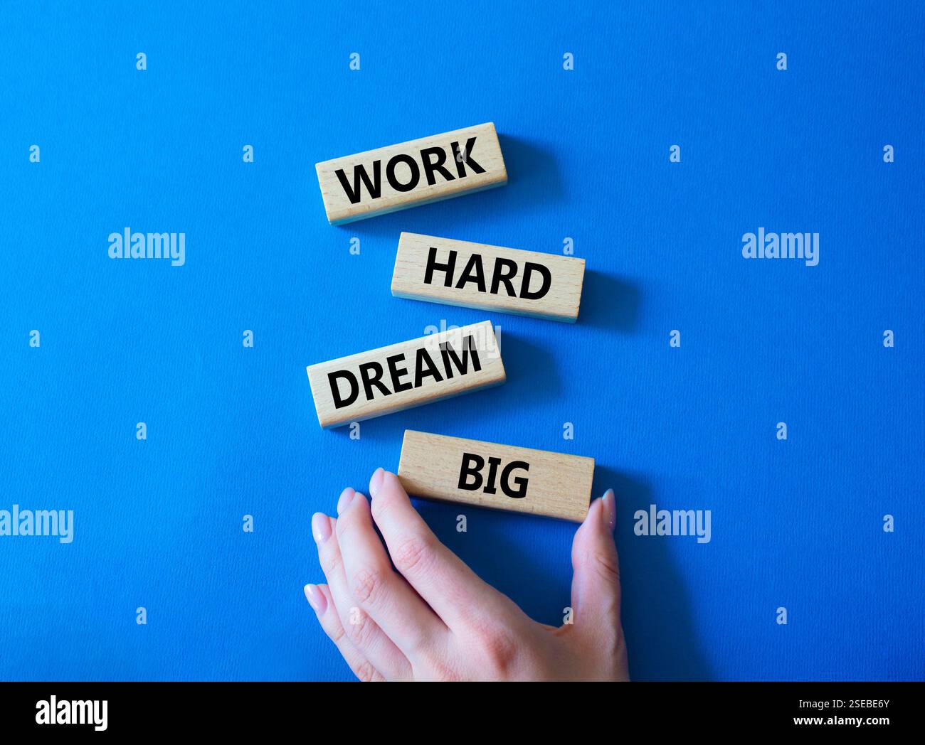 Work and dream symbol. Wooden blocks with words Work Hard Dream Big ...