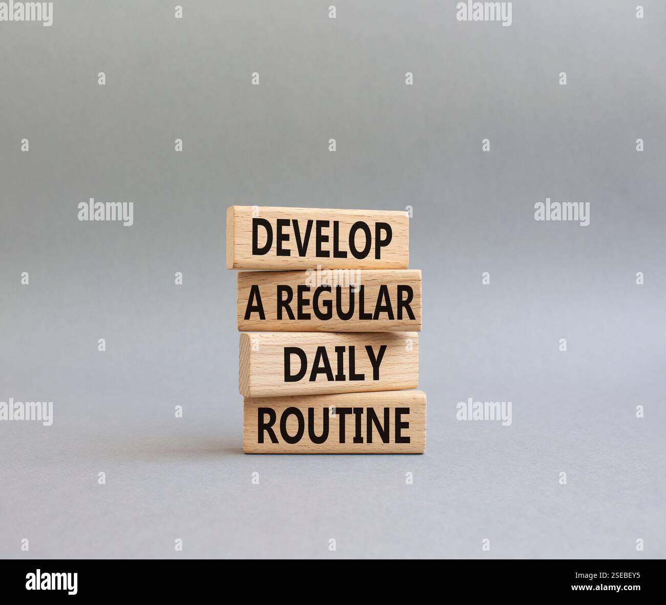Develop a regular daily routine symbol. Concept words Develop a regular ...
