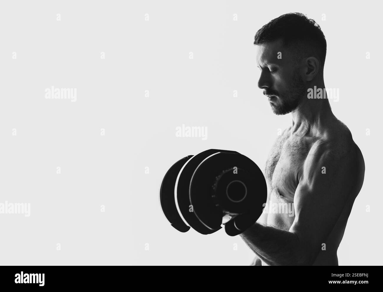 Sport man dumbbell strong Black and White Stock Photos & Images - Alamy