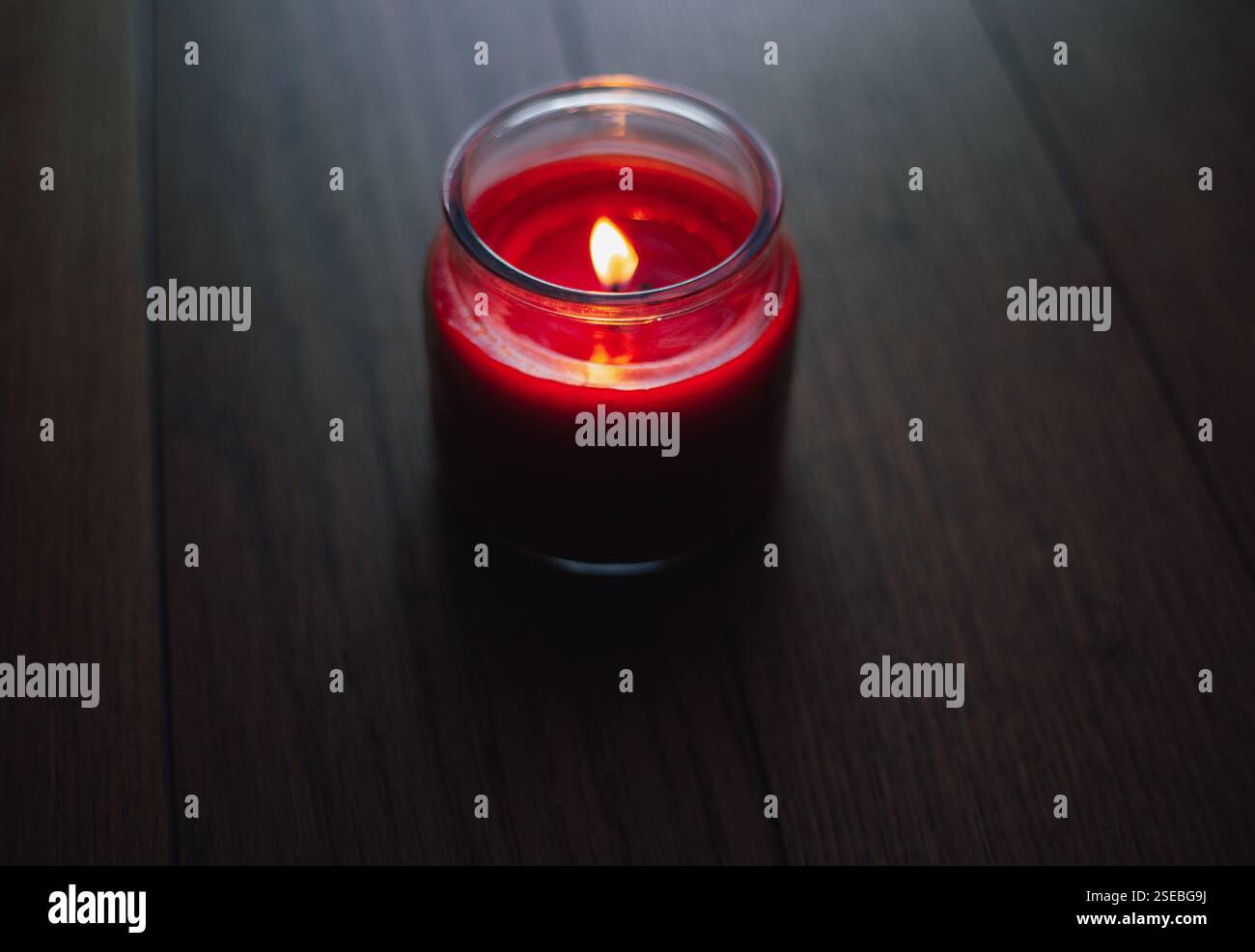 Red aroma candle for home Stock Photo - Alamy