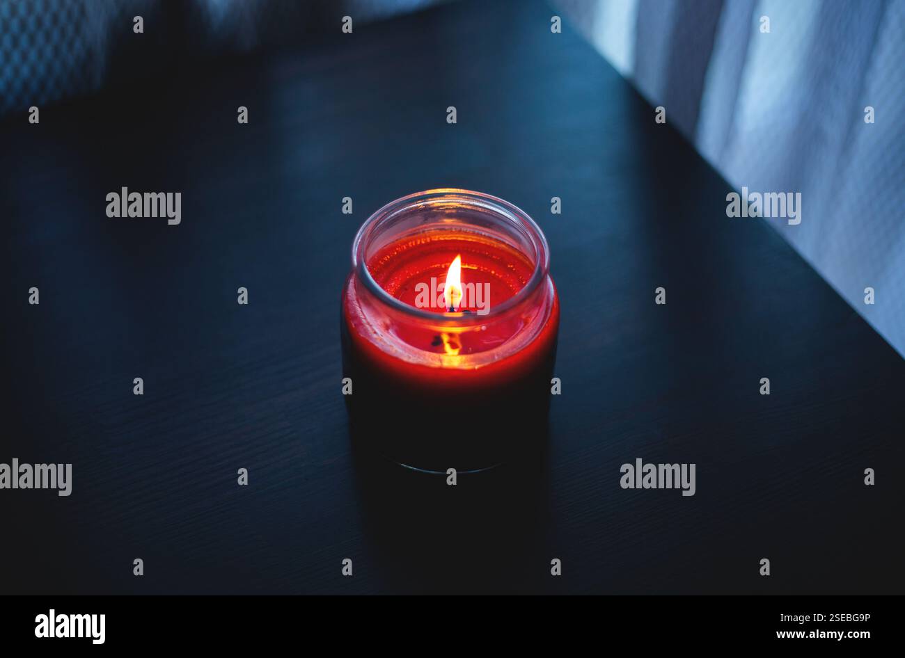 Red aroma candle for home Stock Photo - Alamy