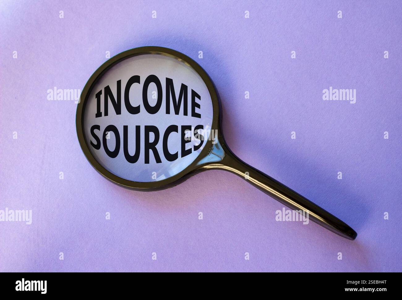 Income Sources symbol. Magnifying Glass with Concept word Income ...