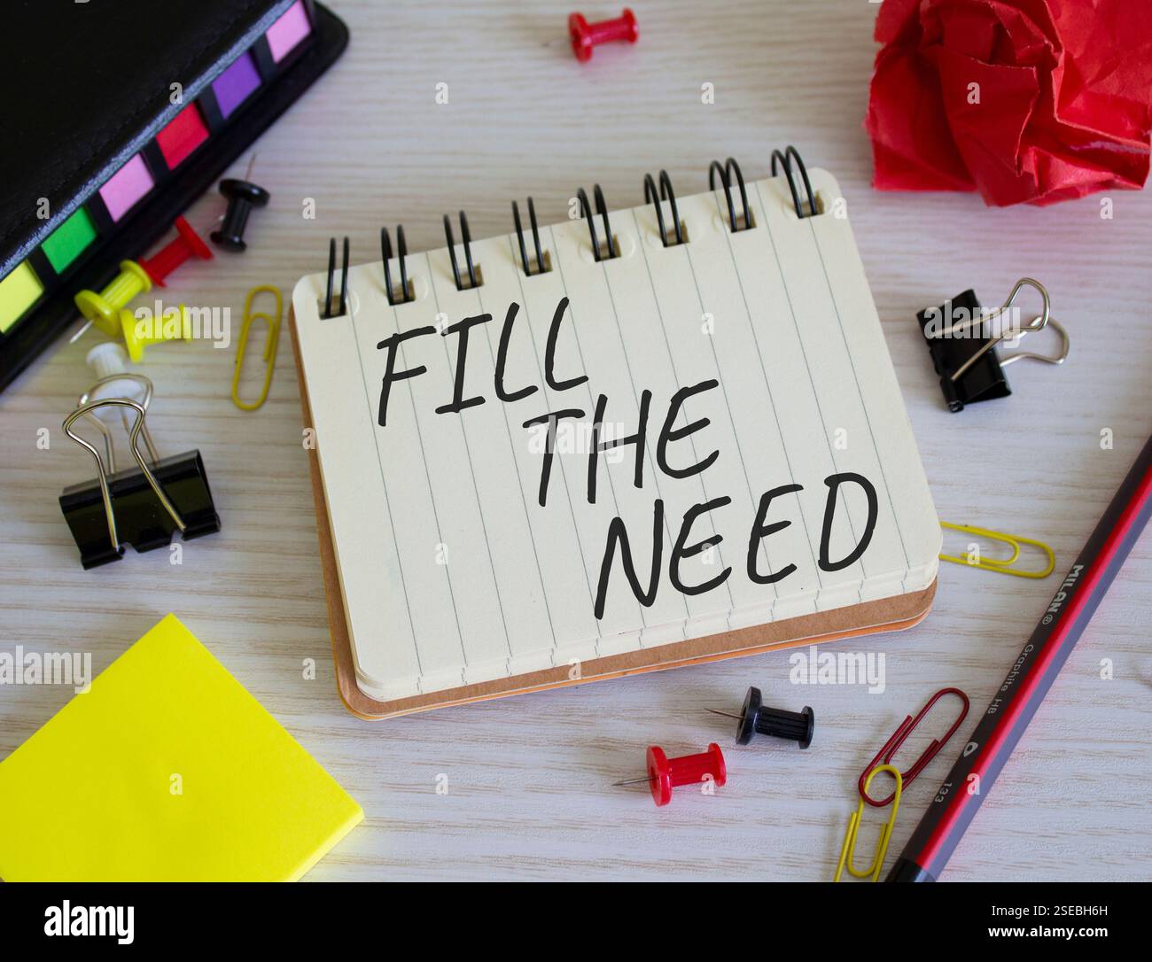 Fill the need symbol. Concept word Fill the need on white notebook ...