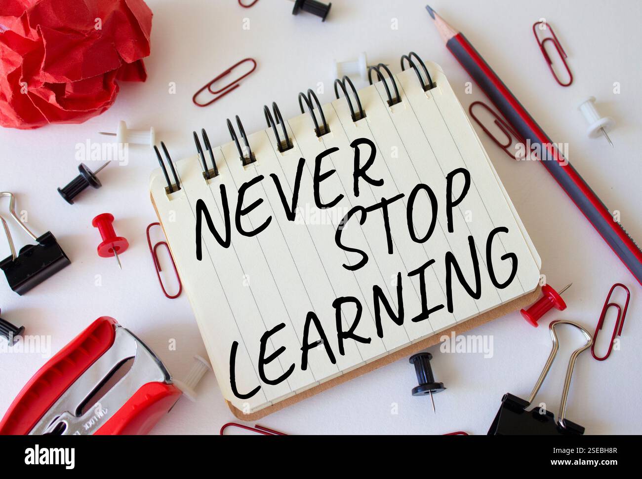 Never stop learning symbol. Concept words Never stop learning on white ...