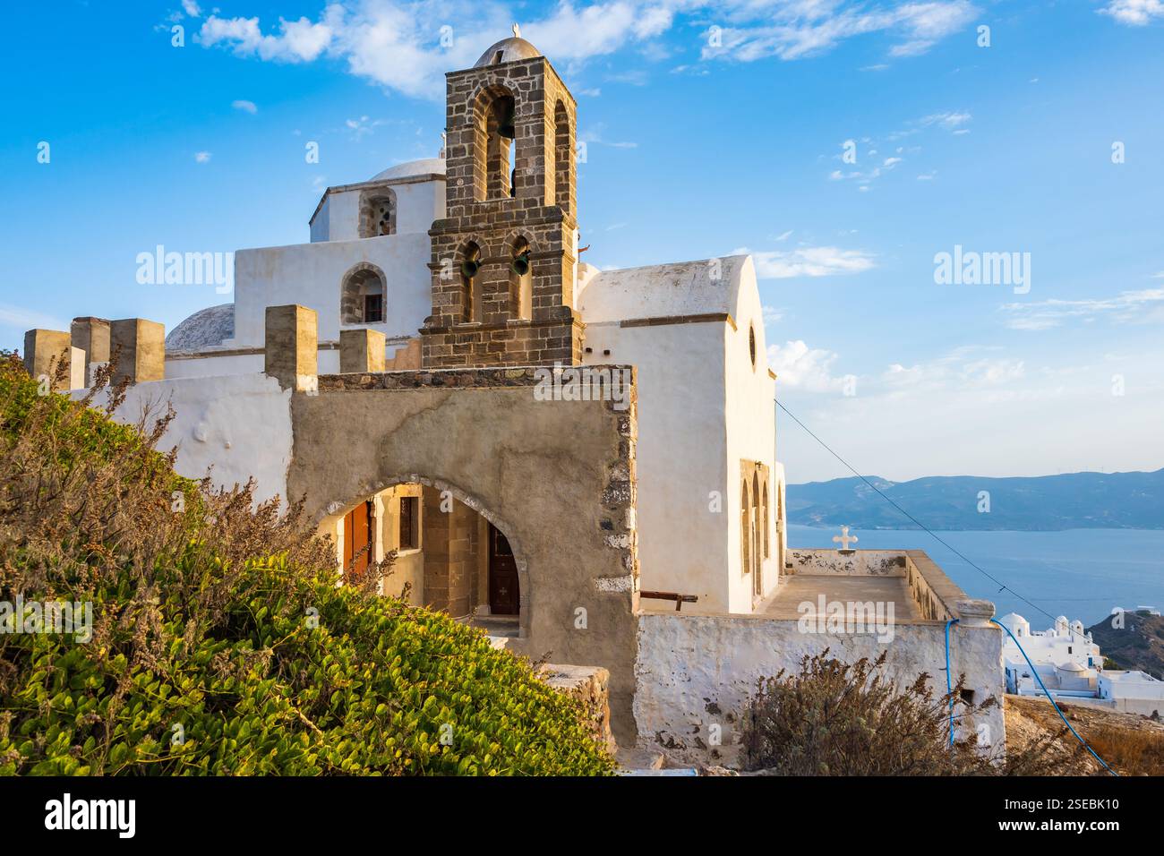 Traditional church in Plaka village at sunset time, Cyclades, Milos ...