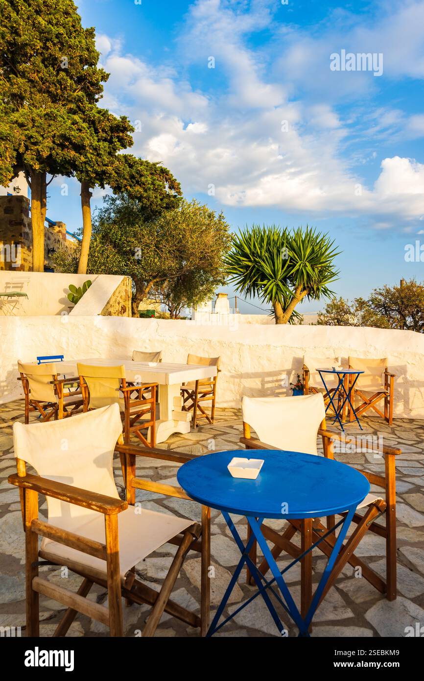 Chairs with tables on terrace of typical Greek tavern restaurant in ...